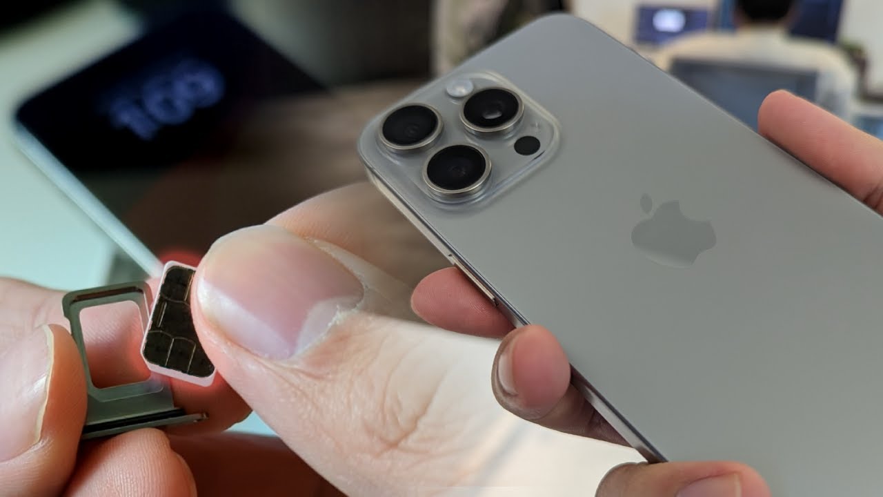 How to Insert a Sim Card into the iPhone 15 models - YouTube