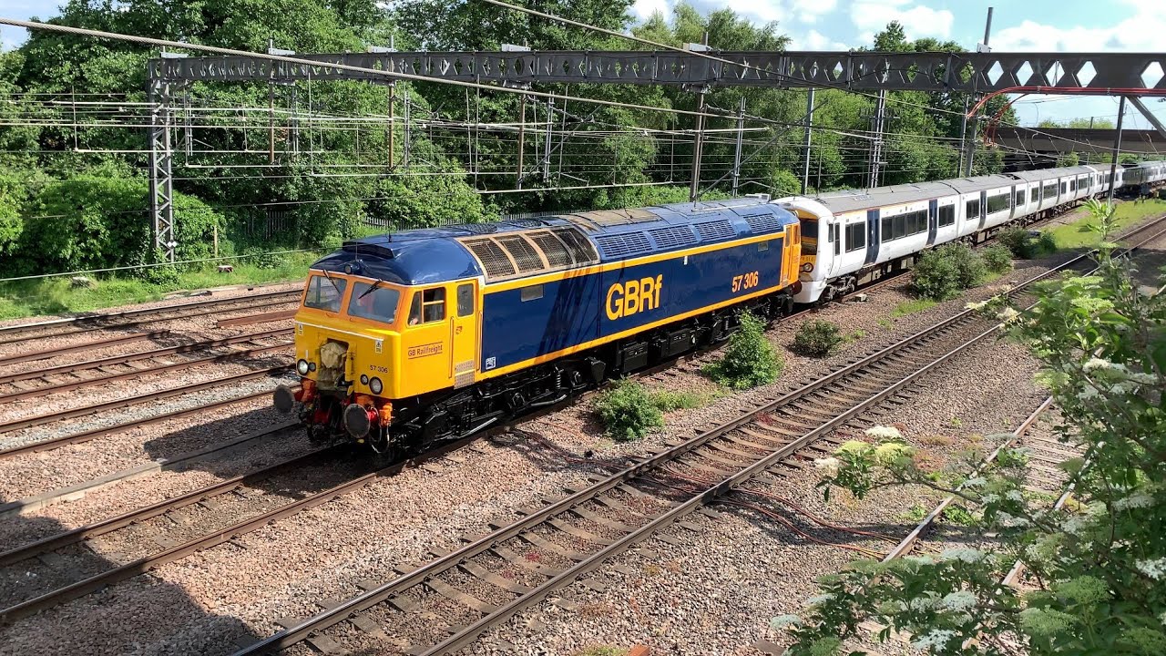 Freshly repainted GB Railfreight class 57, 57306 hauls two class 379 ...