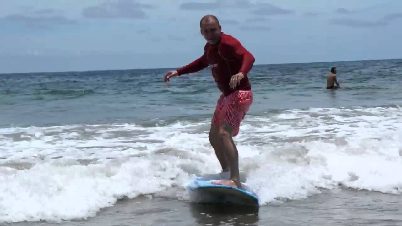 Surfing for the first time - YouTube