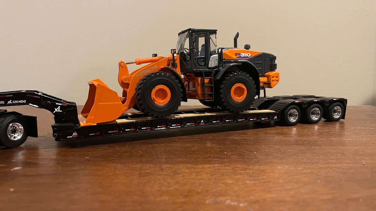 1/50 Scale Construction Stop Motion - Unloading the ZW310 - YouTube