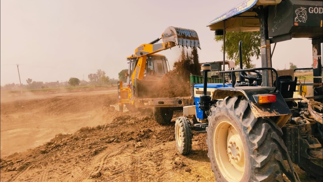 Jcb 3dx video and tractor trali loading soil - YouTube