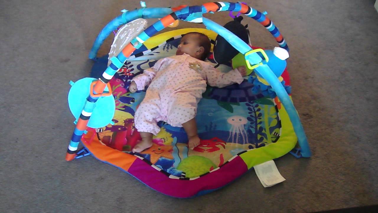 nithya playing on her playmat - YouTube