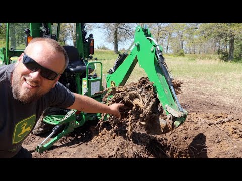 Digging Out a Stump with a Compact Tractor Backhoe - YouTube