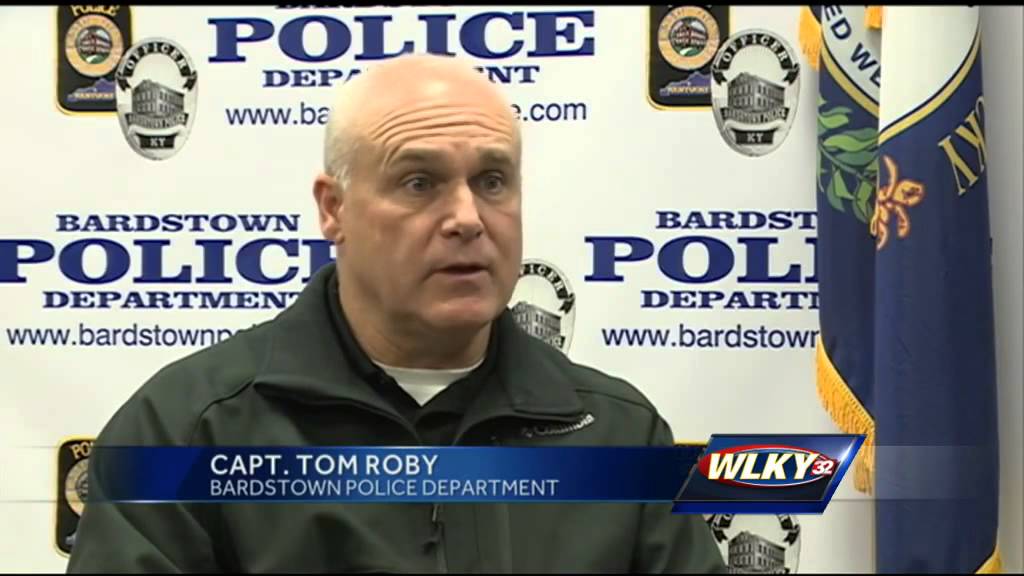 Robbery suspect found hiding behind Christmas tree in bank - YouTube