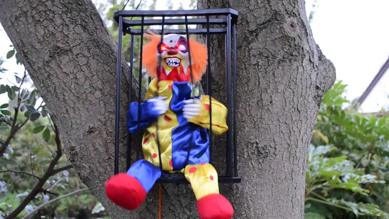 Clown in cage - YouTube