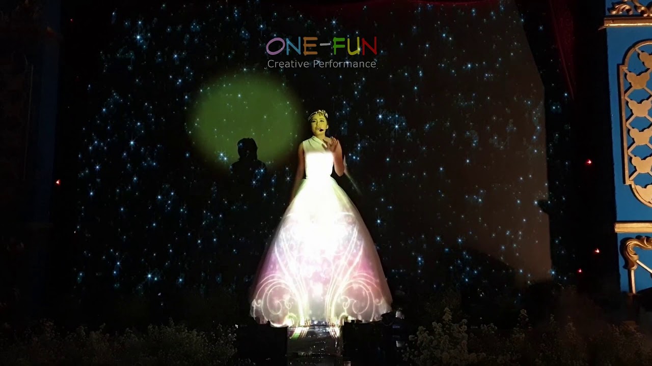 The Glow - Natalie's dress projection mapping and singing performance ...
