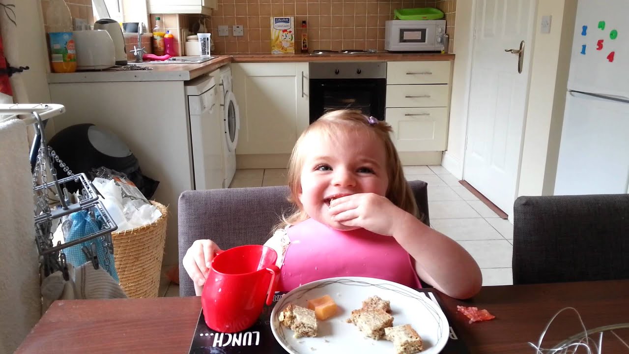 Amelia learning to drink from cup - YouTube