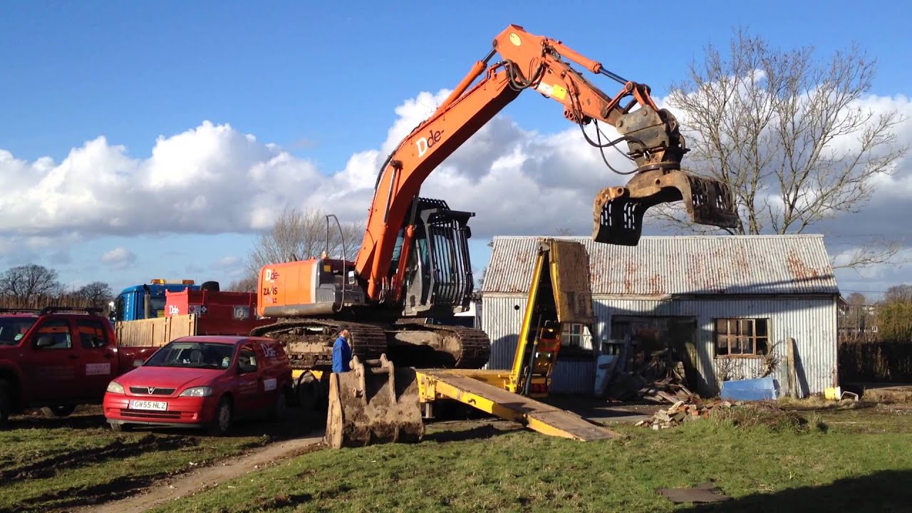 Eco house build 18a: Demolition - digger arrives - YouTube