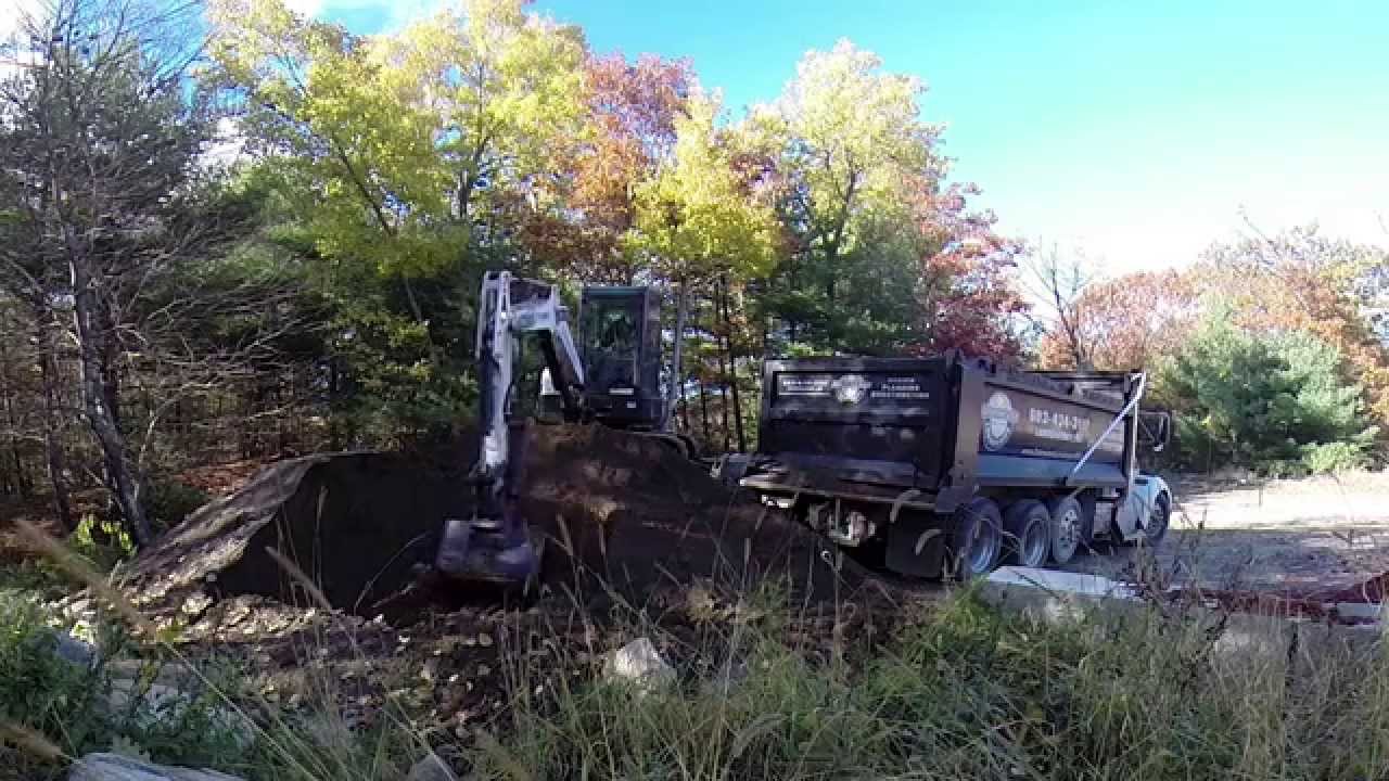 E50 Loading Tri Axle With Fill - YouTube