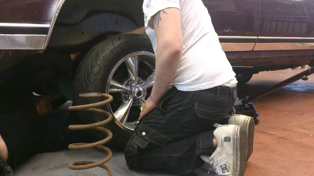 How to change the rear springs on a Chevy Caprice - YouTube