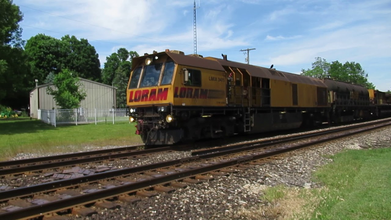 LORAM rail grinding track maintenance equipment passing through Vicksburg, Michigan - YouTube