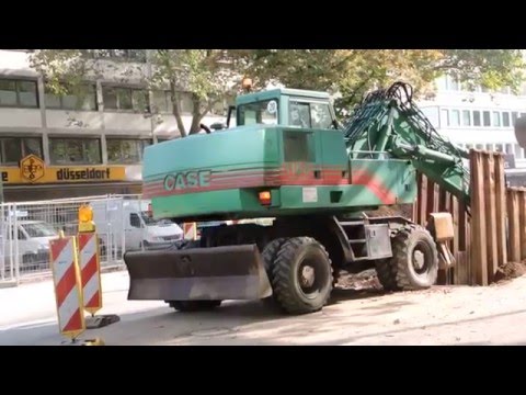 Bagger CASE am Limit Kanalbau  Baggerscheufel als Hammer nix los