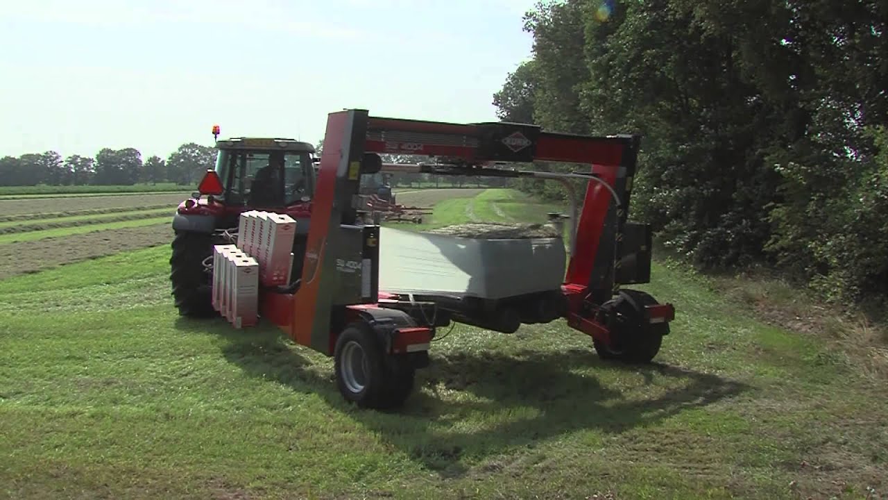 KUHN SW 4004 - Square Bale Wrapper (In action) - YouTube