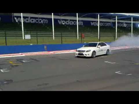 Lewis Hamilton doing donuts at Kyalami circuit - YouTube