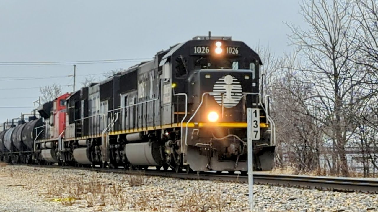 IC1026 SD70, IC1001 SD70, and CN8900 SD70-M2, leading a Southbound CN ...