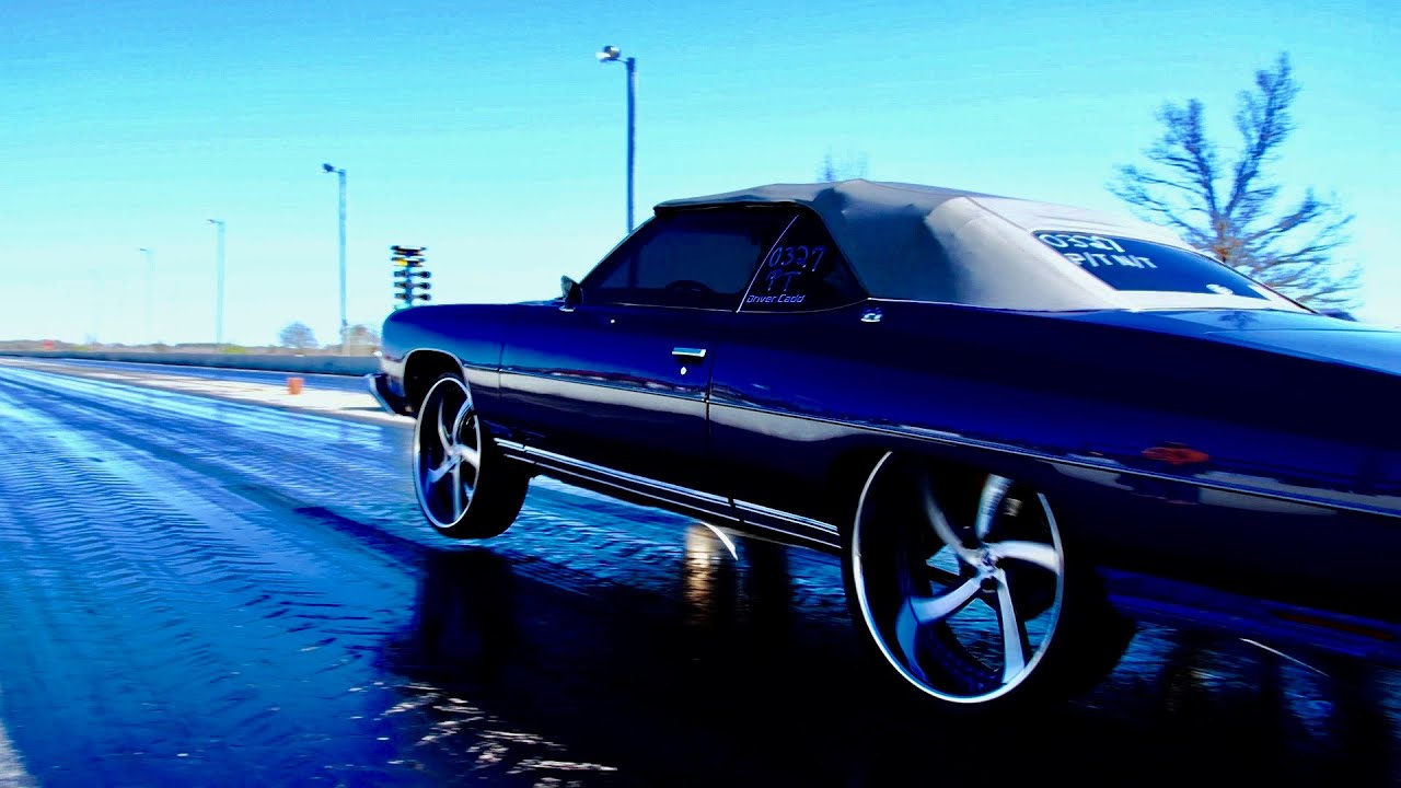 THE BLUE MAGIC TWIN TURBO DONK LEFT WITH THE 26S IN THE SAIR AND FADED ...