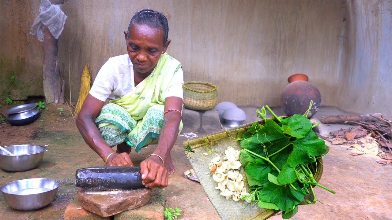 Grandmother Cooking Pumpkin Leaves & Wild Mushroom for her Lunch ...