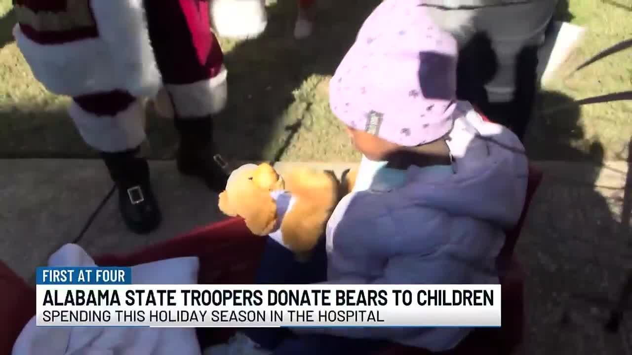 Alabama state troopers donate bears to children at Baptist East - YouTube