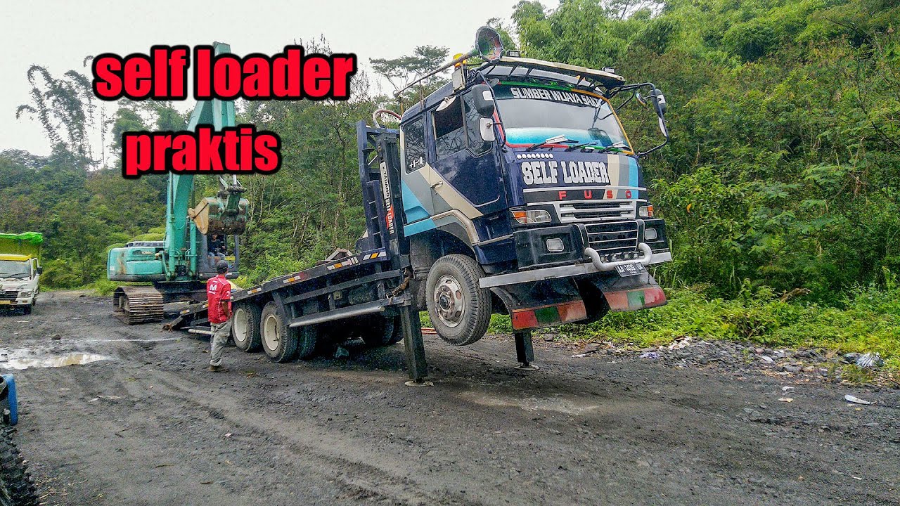 self loader menurunkan excavator - YouTube