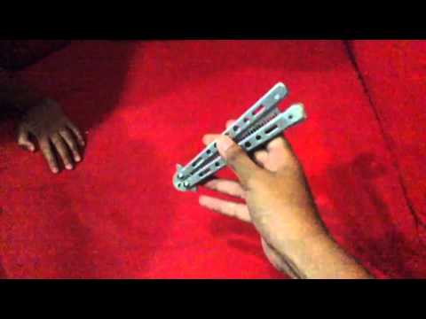Butterfly Knife Tricks In Slow Motion - YouTube