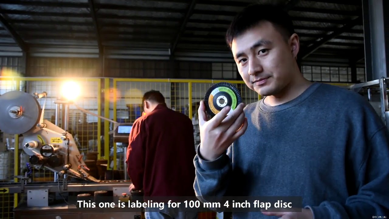 Semi automatic flap disc labeling machine - YouTube