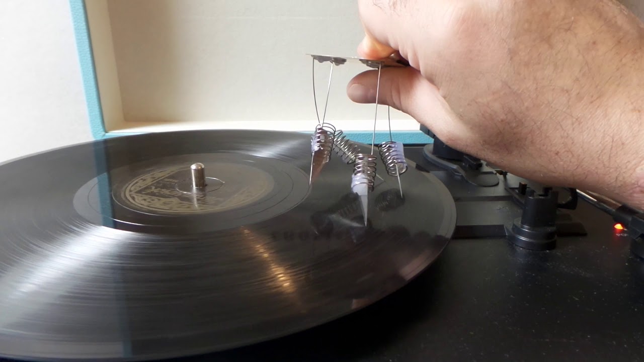 78 RPM Record Played With Four Knife Blades Attached to Springs - YouTube