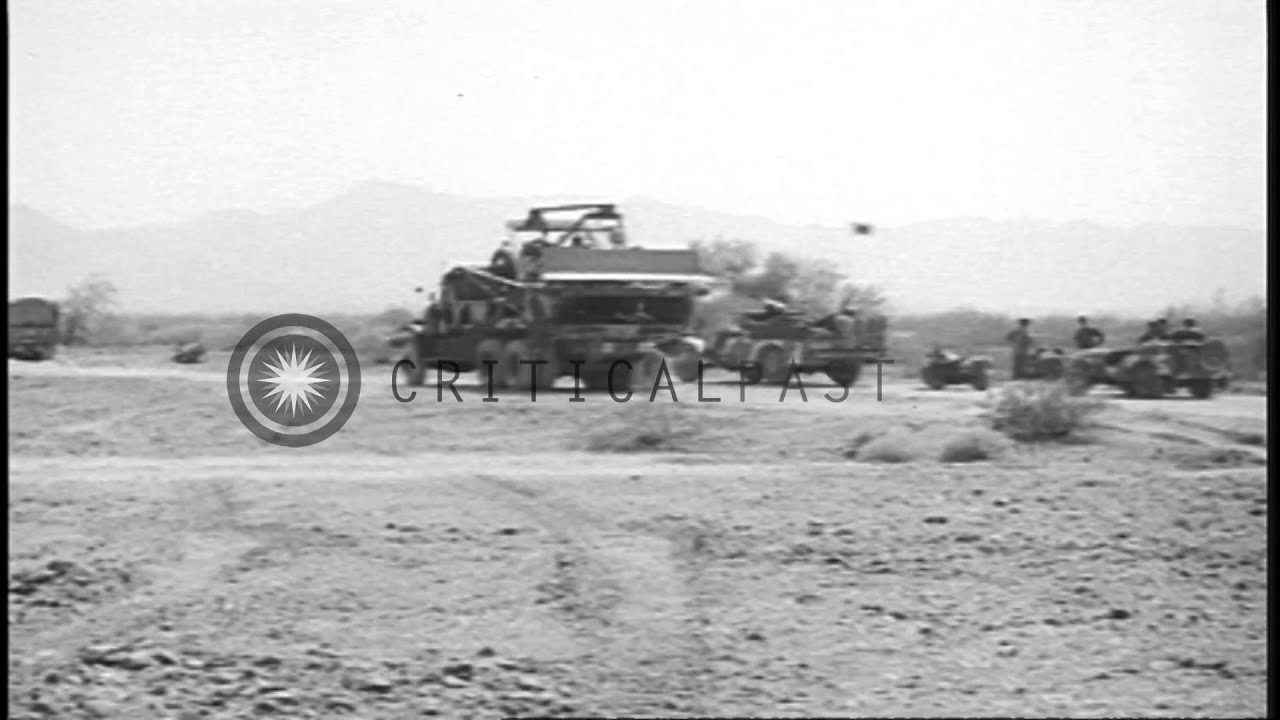 US Army IX Corps bulldozer and road grader in operation, and a convoy ...
