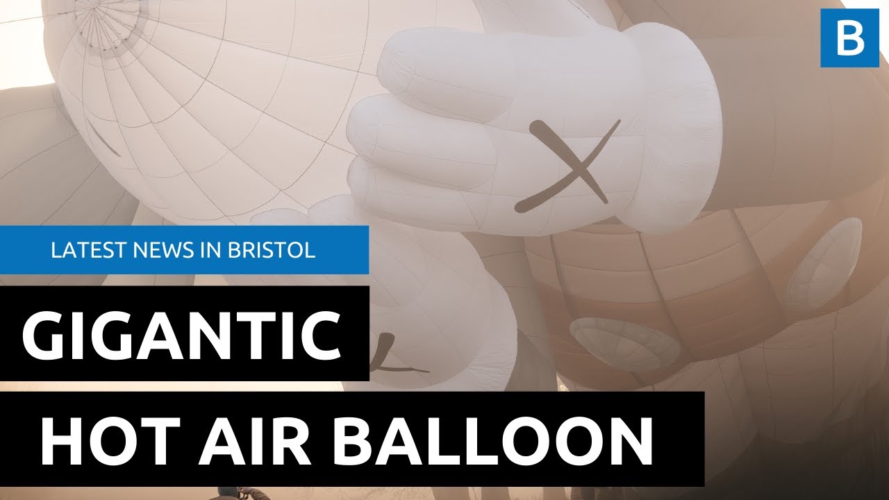 Artist KAWS GIGANTIC hot air balloon flies over Bristol - YouTube