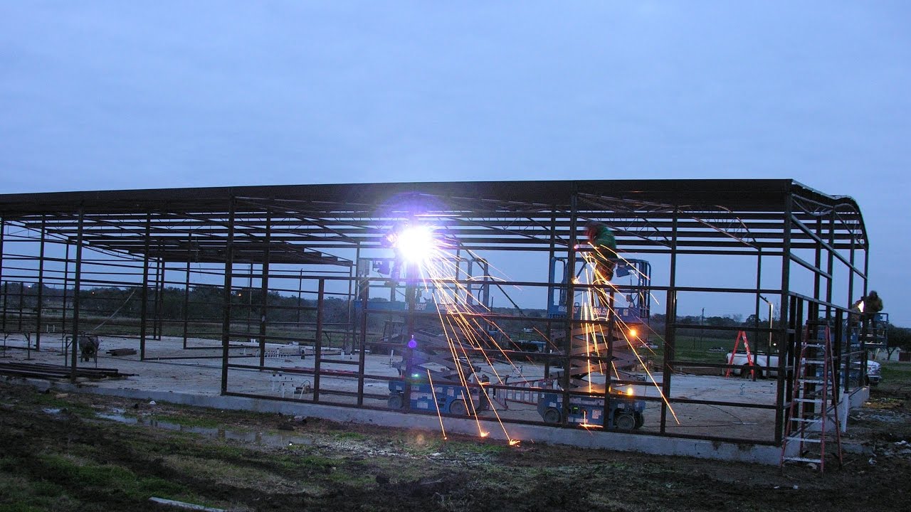 WDMB erects a metal building with roof extension - YouTube