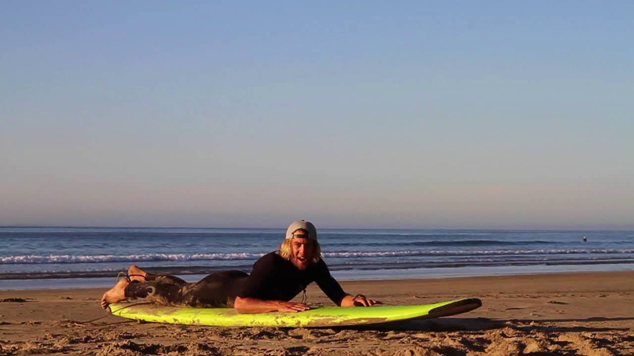 How to Surf: Standing up - "Pop Up" technique - YouTube