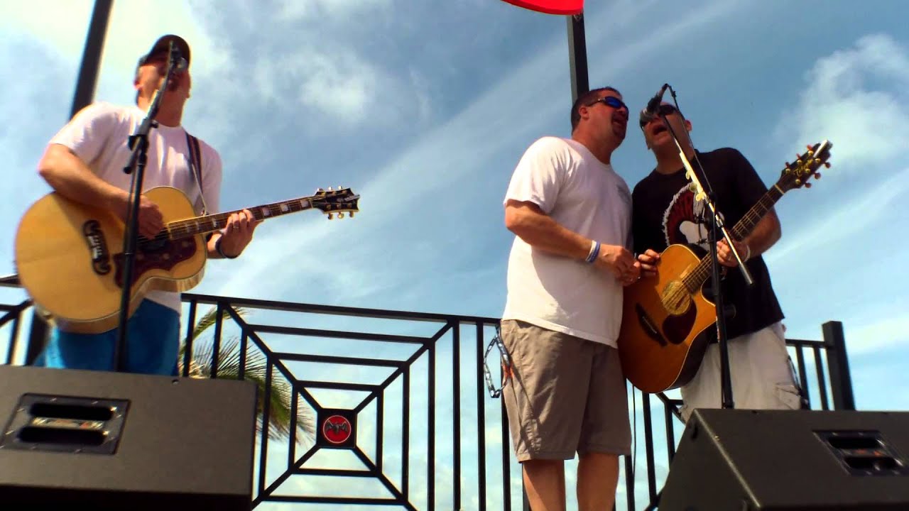 Ken and Drew set on the beach at the Great Stirrup Cay with Edwin ...