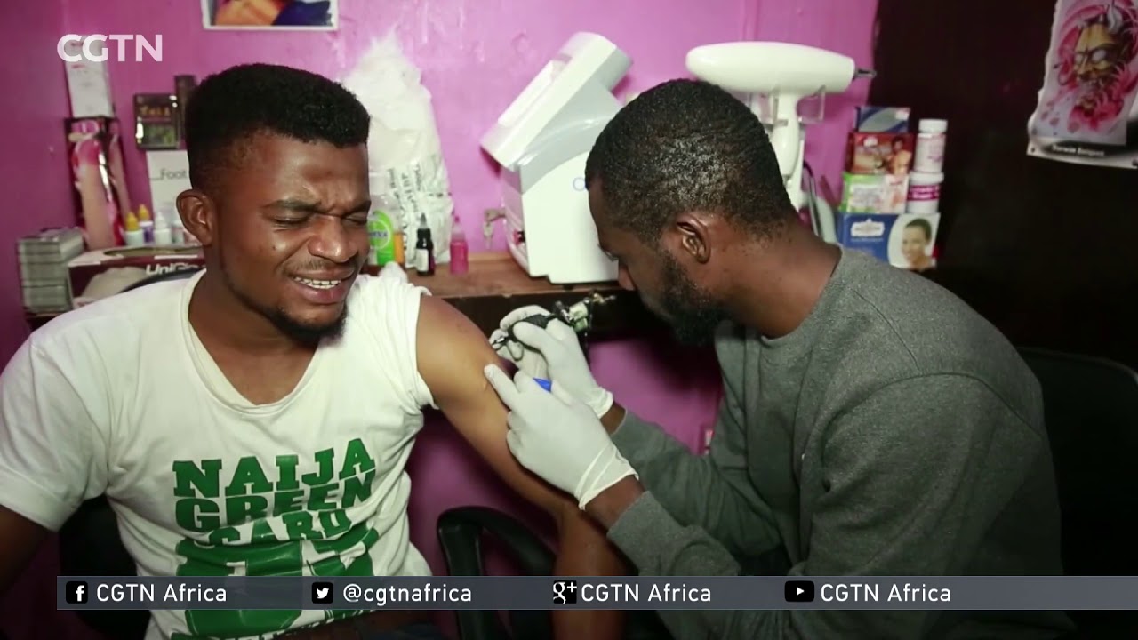 Nigeria: Tattoos become increasingly popular among young people - YouTube