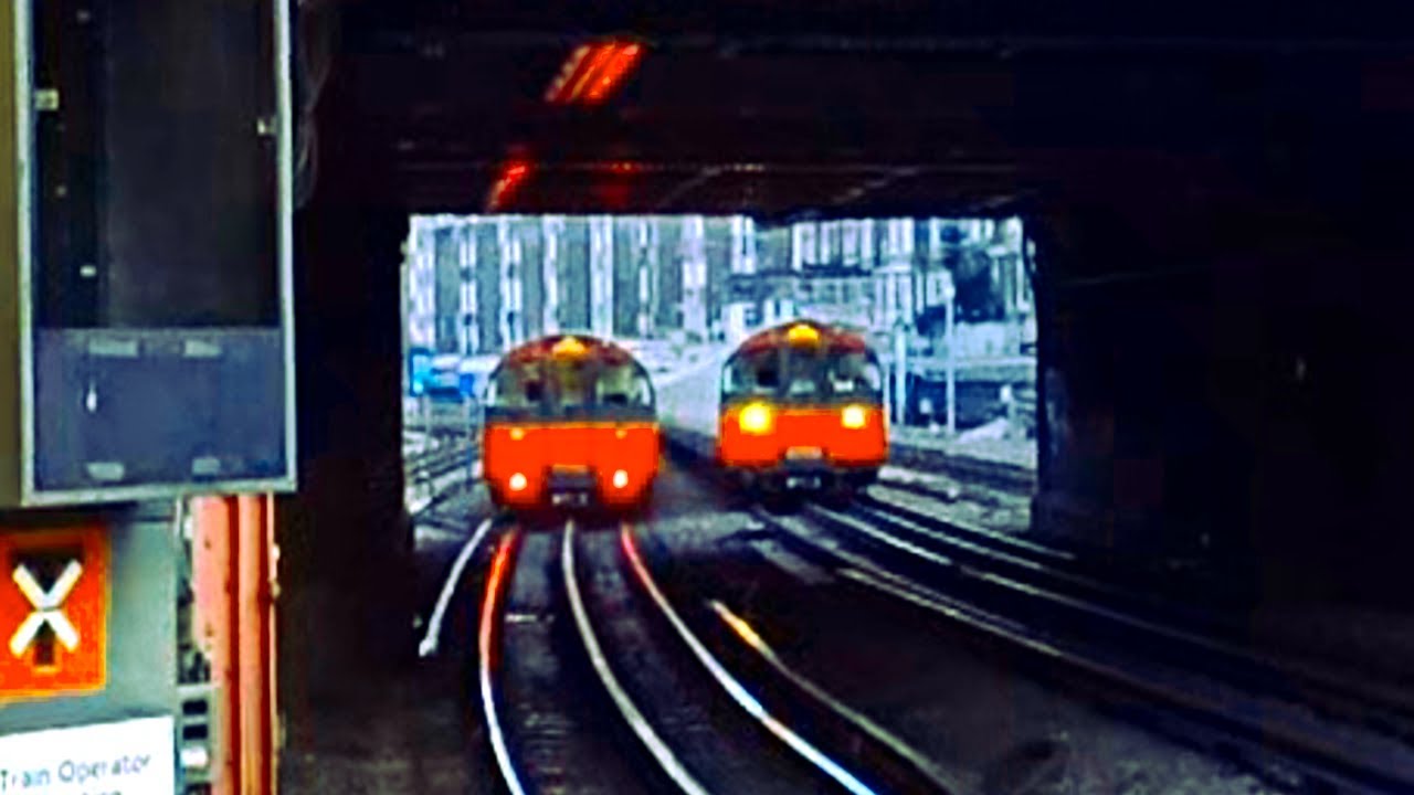 🚇 1973 TUBE STOCK CROSSING at BARONS COURT (London Undergorund) - YouTube