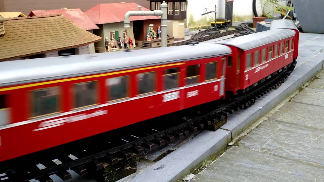 RhB - LGB 2040 "crocodile" and custom-made red passenger wagons - YouTube