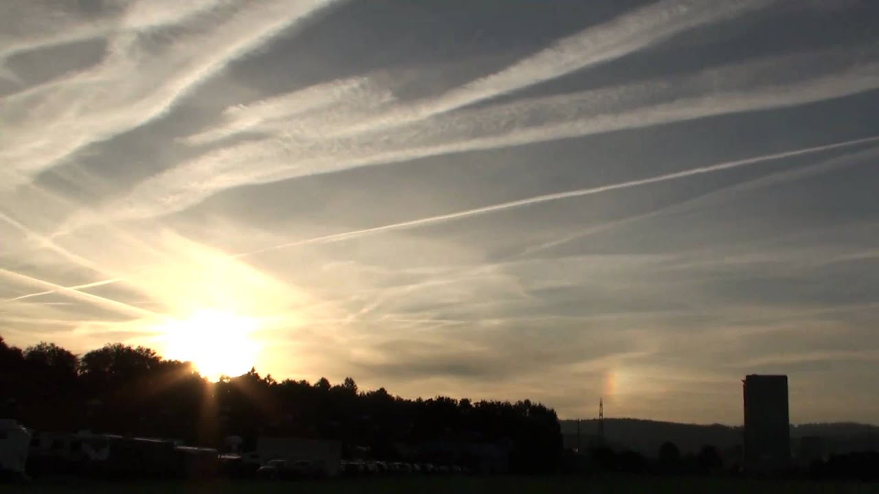 Weird Sky over Switzerland with Phenomenom Rainbow Cloud HAARP ? - YouTube
