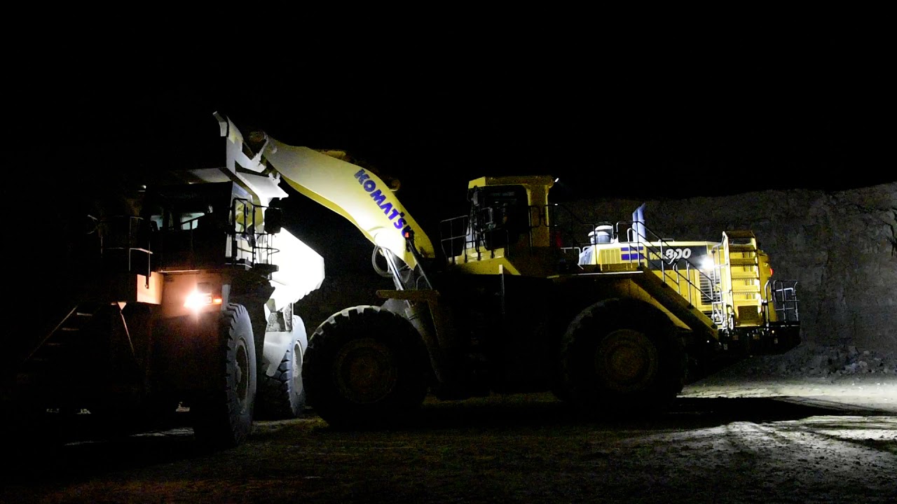 Brand new Komatsu WA800-8 loading HD785 - YouTube