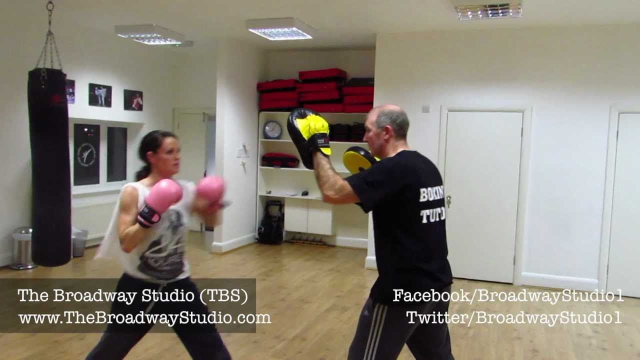 Boxing pad work: Coach McBride on the pads with Katie "K80" Rao - YouTube