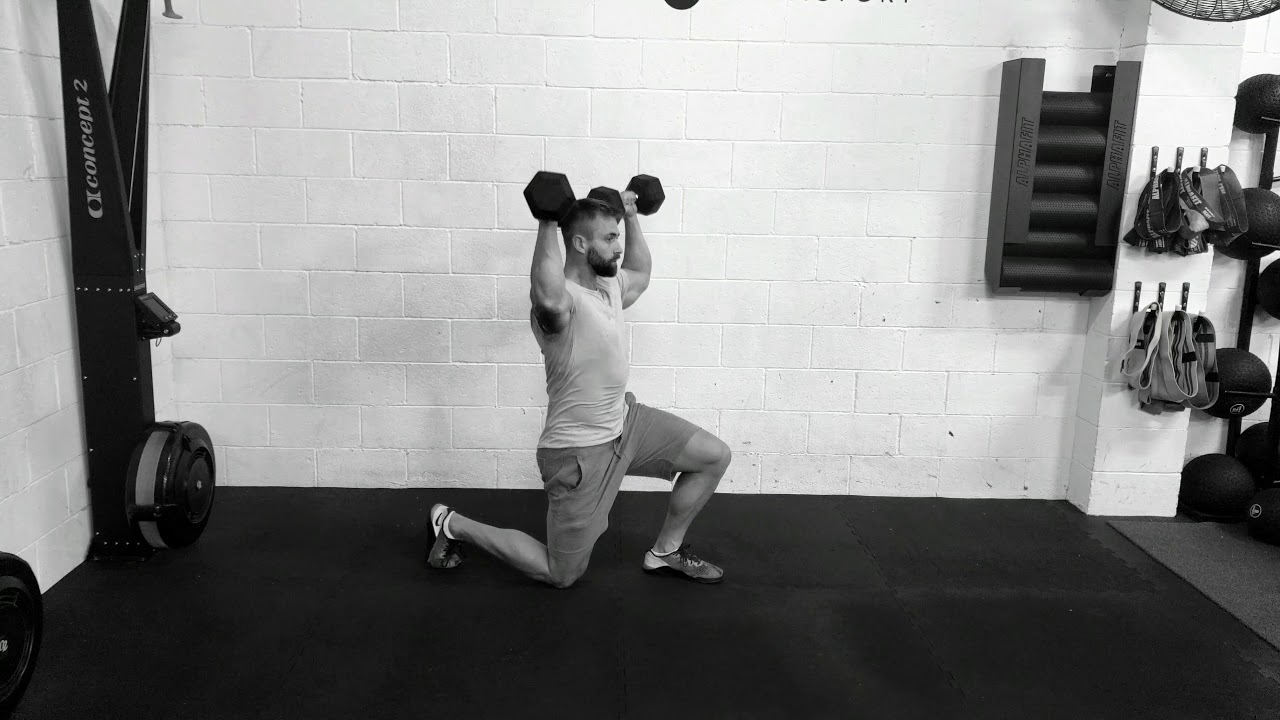 Eccentric ½ Kneeling DB Overhead Press - YouTube