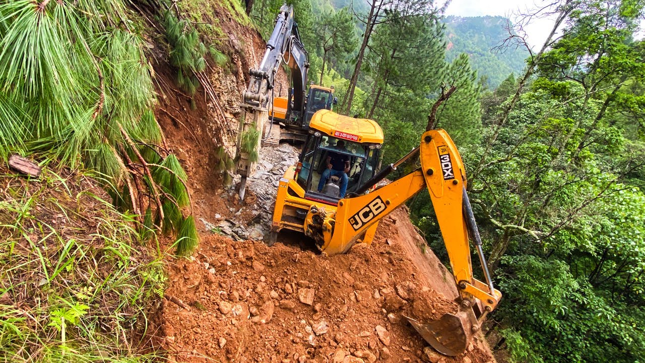 Building a New Road on a Treacherous Mountain with an Excavator ...
