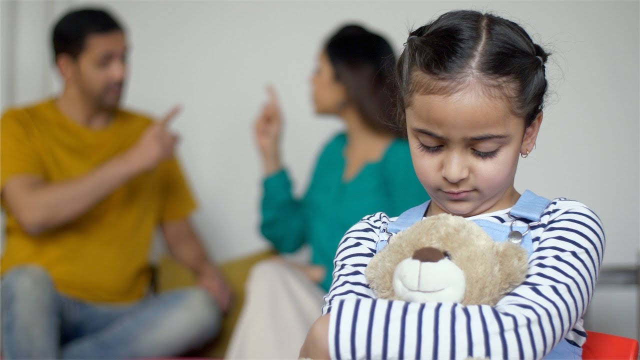 Parents fighting - Little Indian girl feeling upset as her par ...