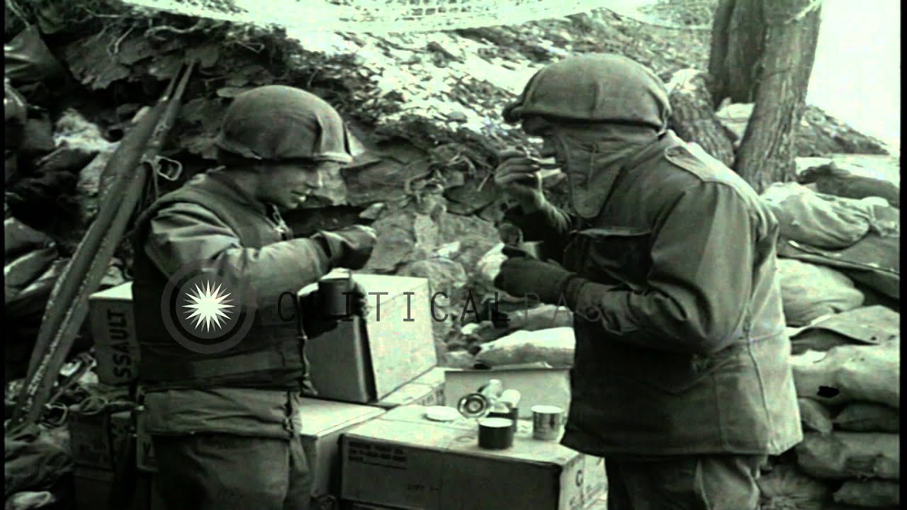 Sergeant Tubb and Private First Class Hill eat C-rations on return from ...