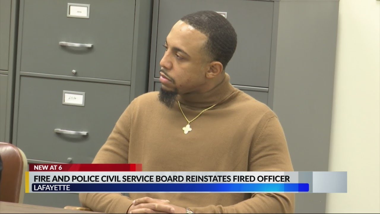 Fired officer gets his job back - YouTube