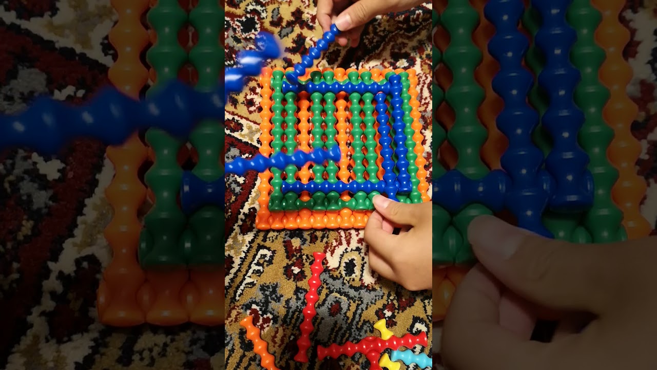 Making a pyramid with a fun sticks toy - YouTube