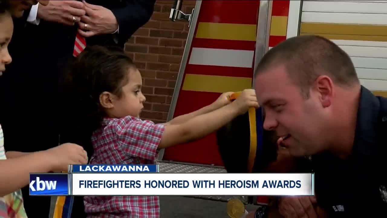 Firefighters honored for saving two children - YouTube