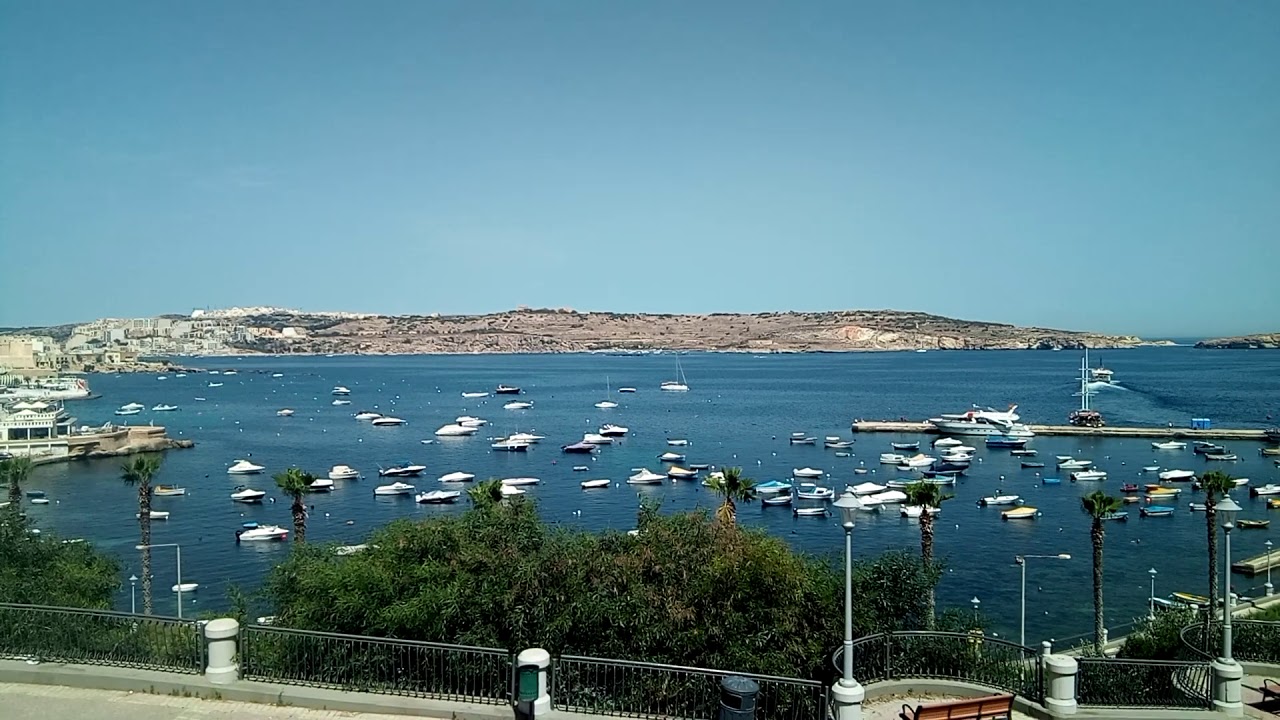 bugiba bay from above by day - YouTube