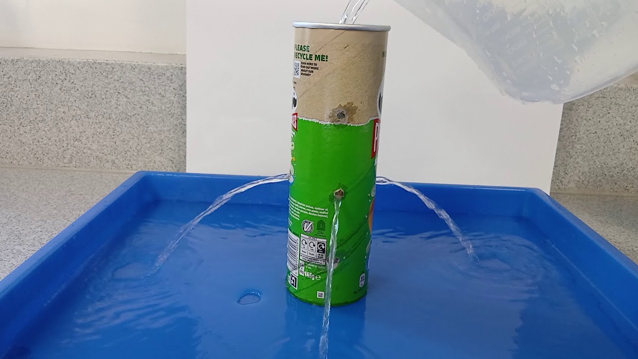 2 Pringles tin pressure experiments you can do at home! #physics #explorephysics #physicsfun ...