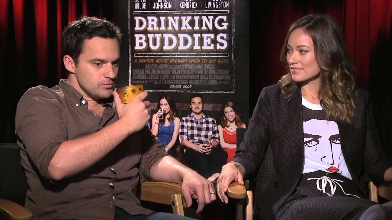 Olivia Wilde and Jake Johnson play a drinking game with Andrew Freund ...