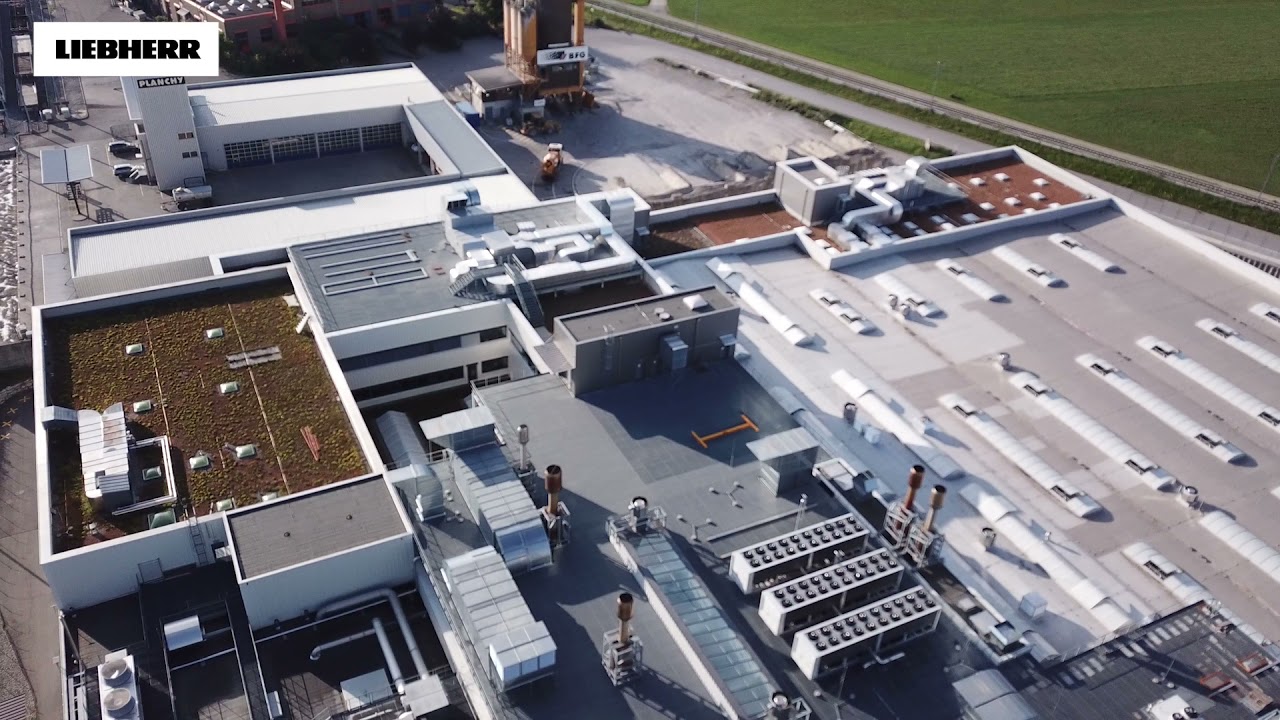 Timelapse construction de l'usine LIEBHERR à Bulle - Suisse - YouTube