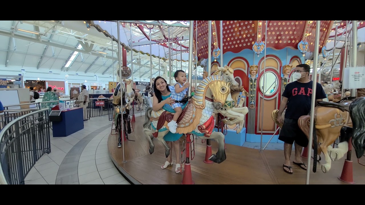 Carousel horse ride in mall - YouTube