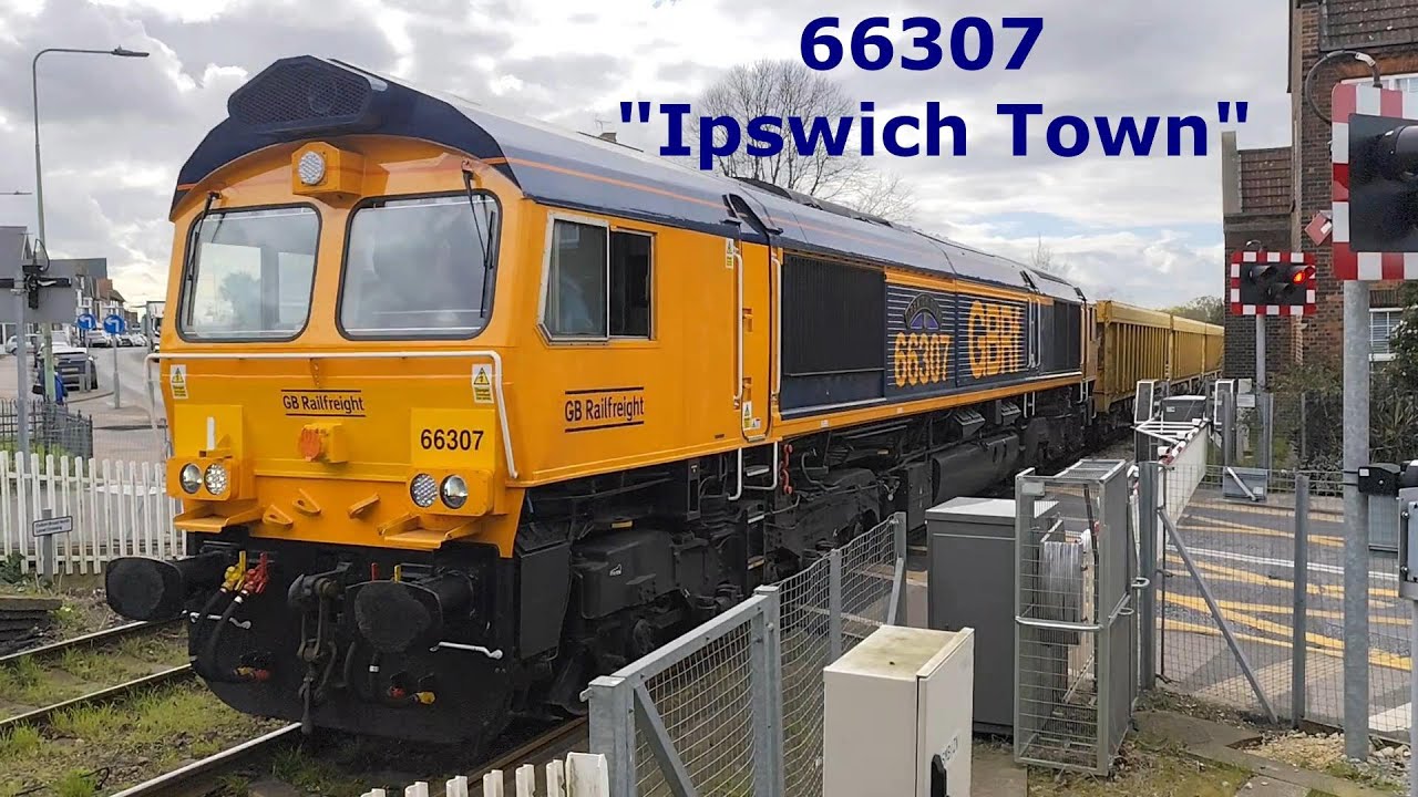 Class 66 GB Railfreight 66307 "Ipswich Town" ballast train Passing ...